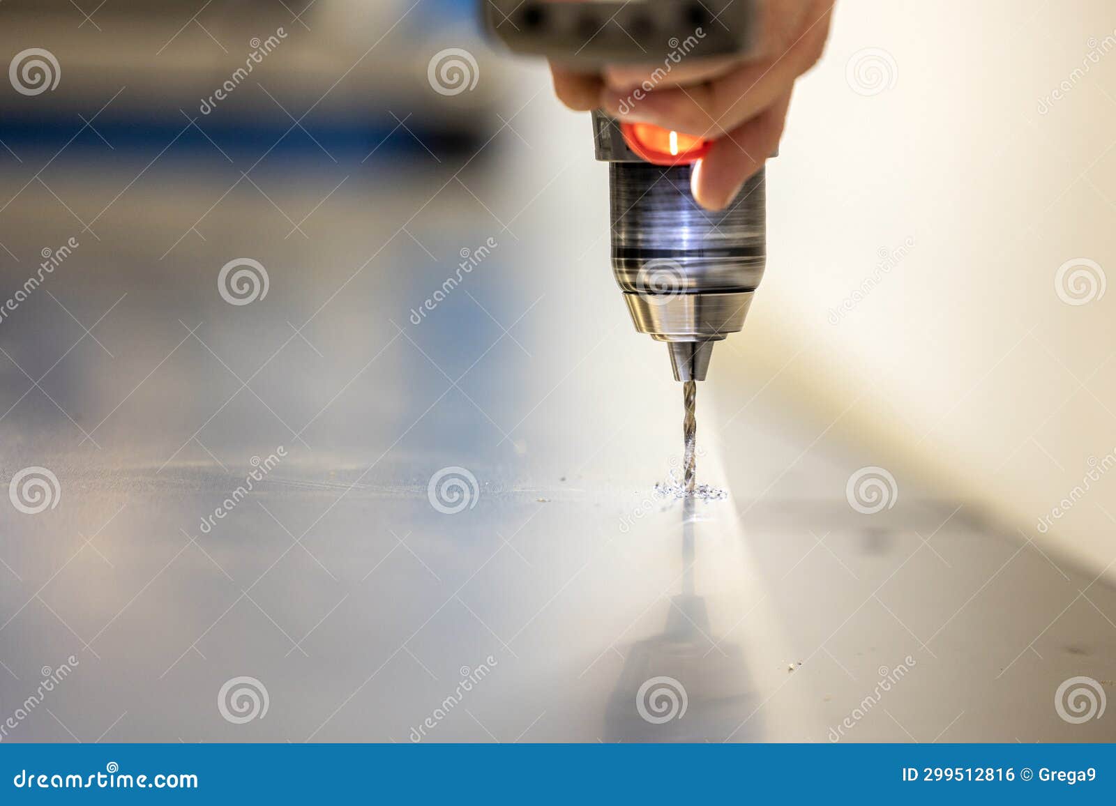Drilling a Hole in the Metal Sheet Stock Photo - Image of metal, work ...