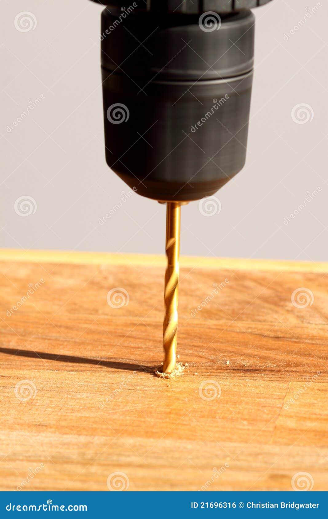 Drilling hole into wood stock photo. Image of hole, carpentry - 21696316