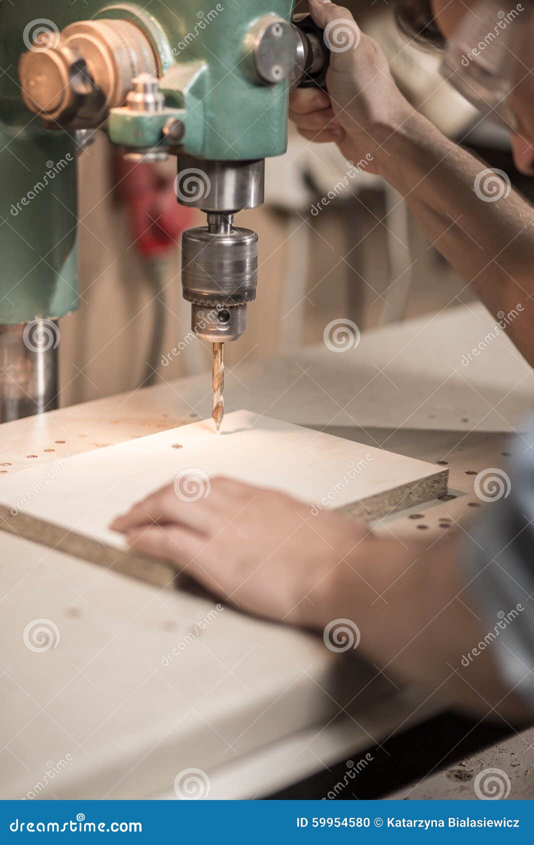 Drilling a hole in wood stock photo. Image of manipulate - 59954580