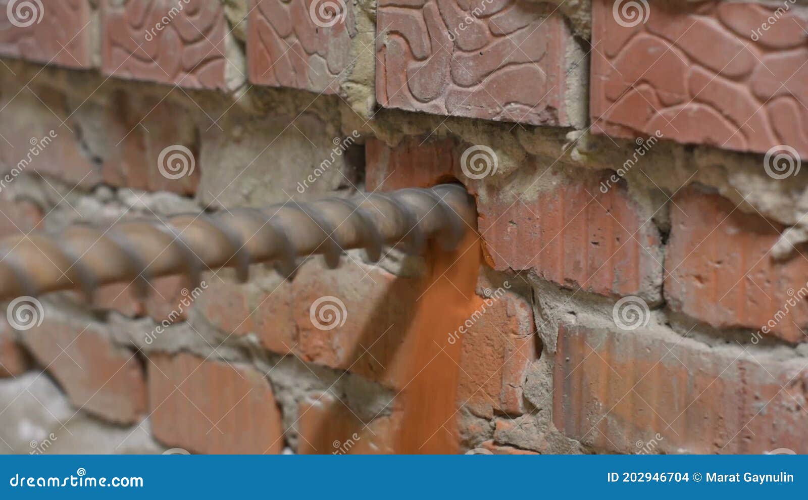 Drilling Holes in a Brick Wall. a Perforator and a Powerful Drill ...