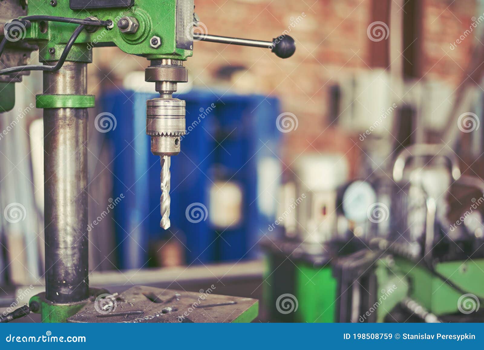 Drilling Machine Against the Background of the Workshop. Stock Image ...