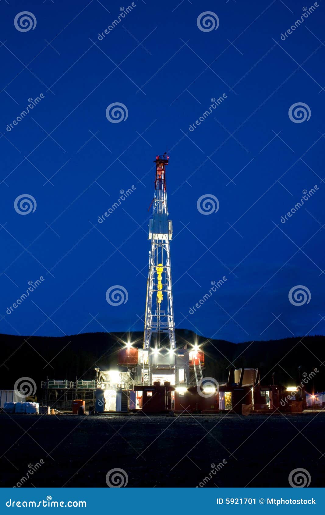 Drilling rig at night stock image. Image of compressor - 5921701
