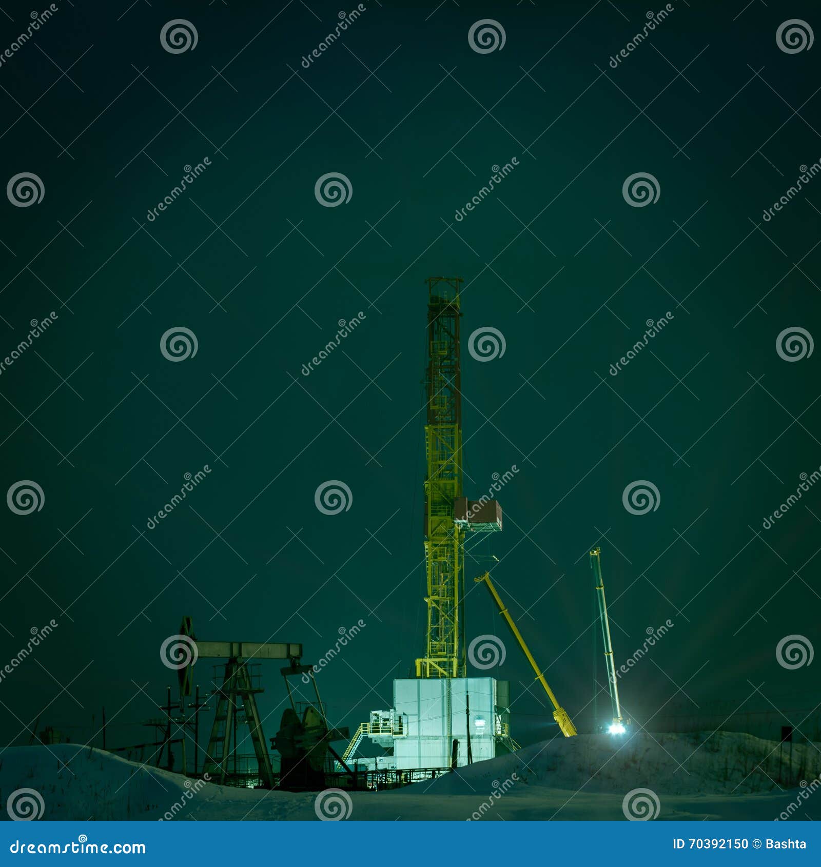 Drilling rig at night. stock photo. Image of fuel, power - 70392150