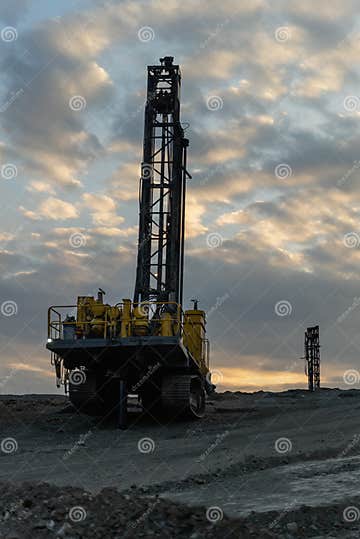 Drilling Rig in an Open Pit. Stock Photo - Image of time, drilling ...