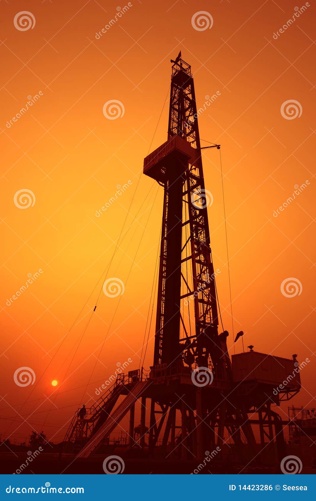 Drilling rig at sunset stock photo. Image of drill, night - 14423286