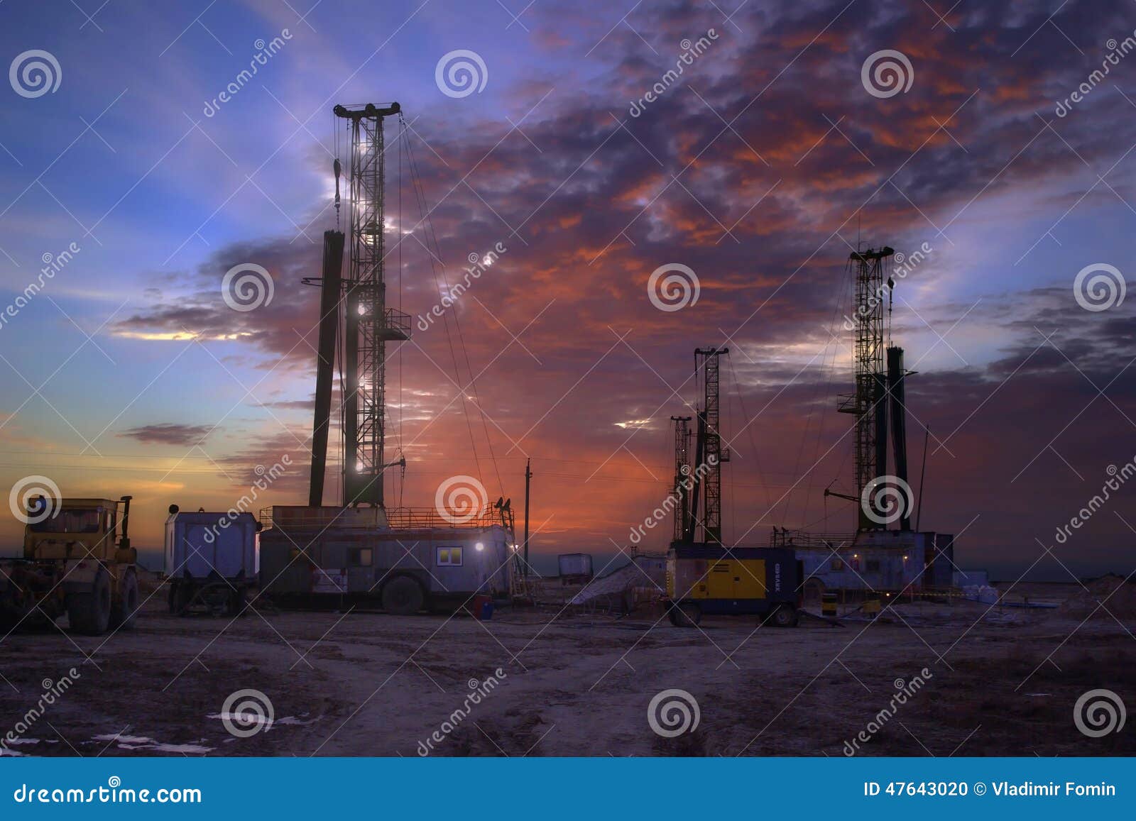 Drilling rigs at daybreak stock photo. Image of morning - 47643020