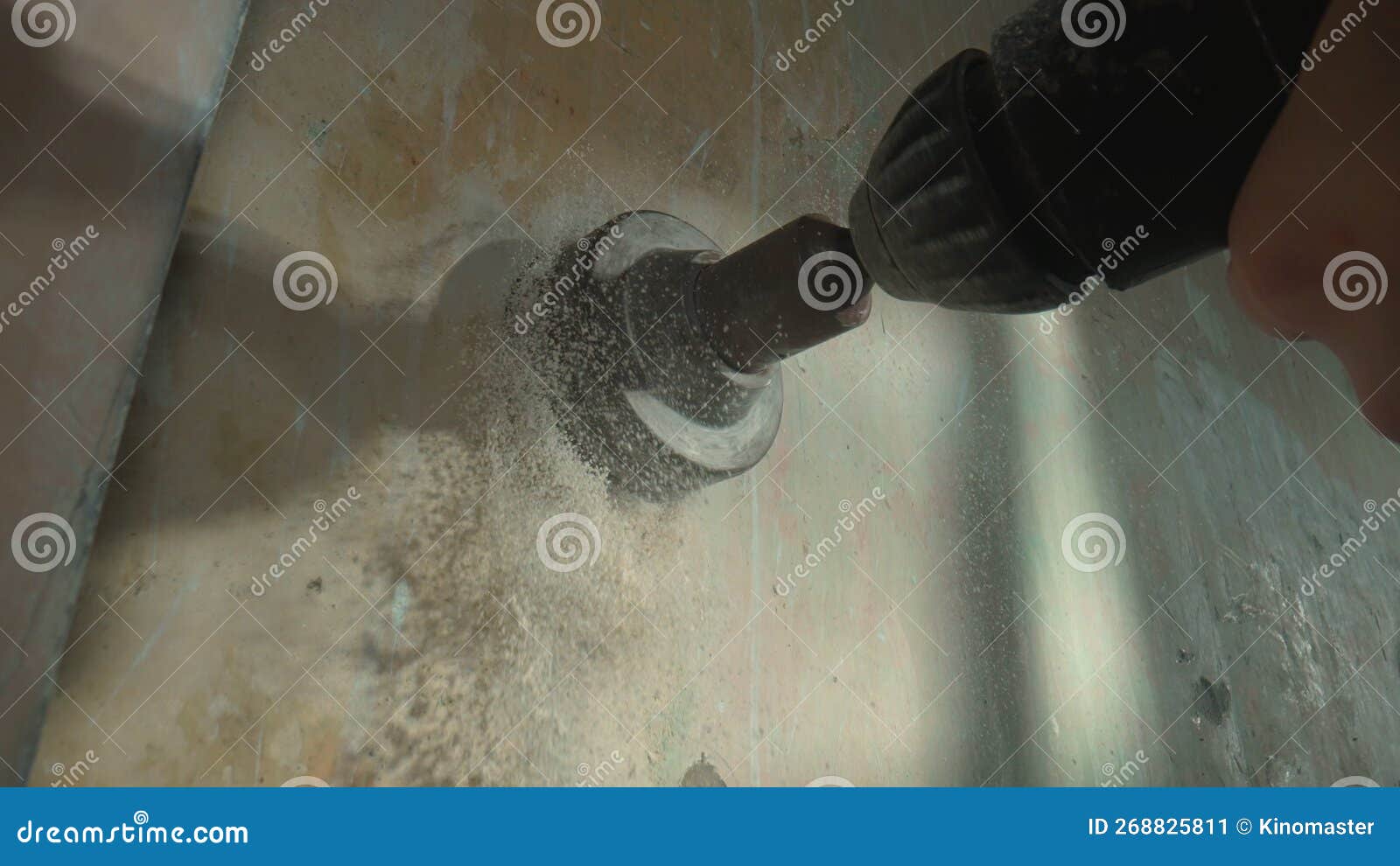 Drilling a Round Hole for Socket on a Gray Concrete Wall. Round Nozzle ...