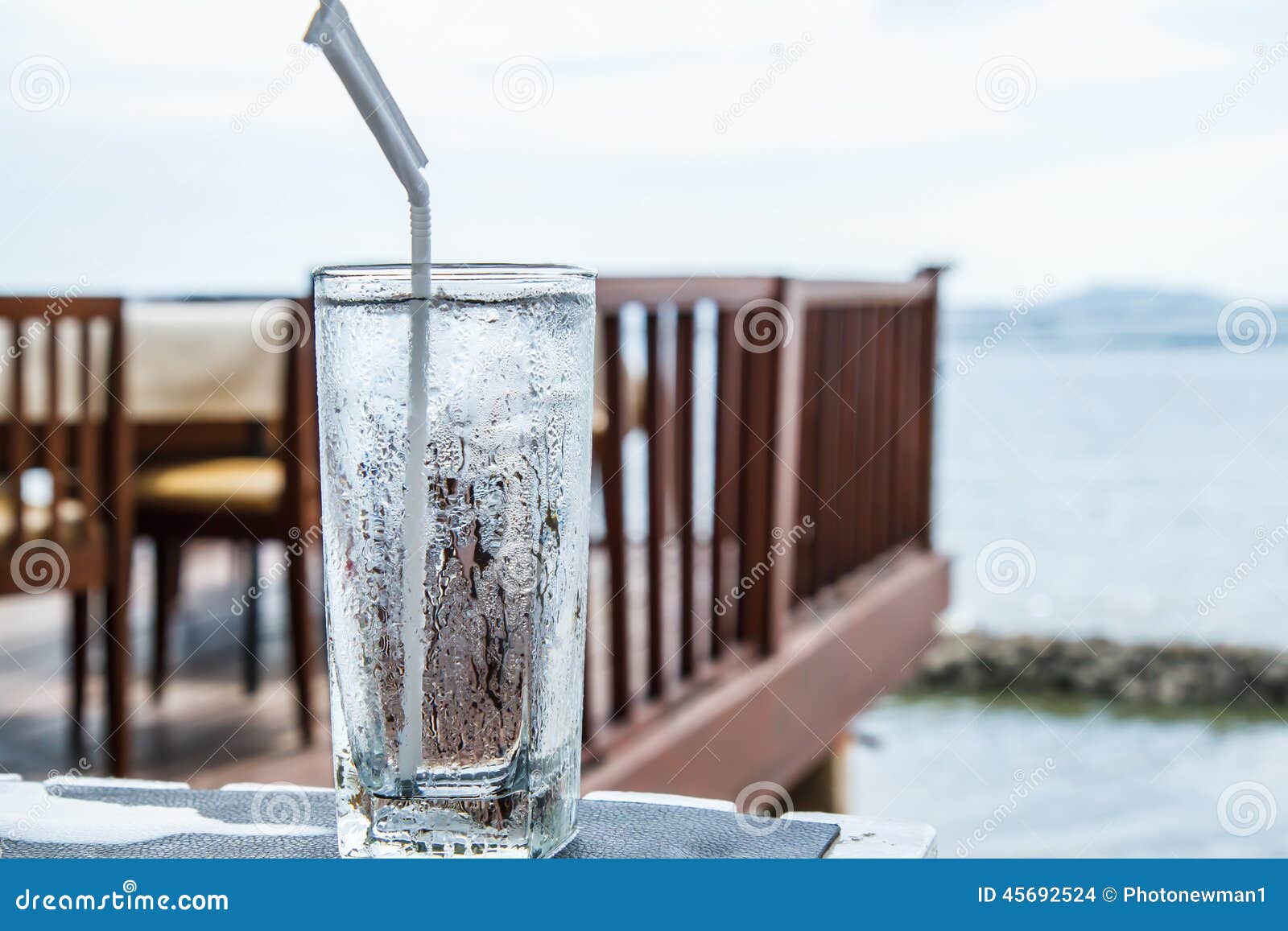 Drink a glass of water stock photo. Image of liquid, table - 45692524