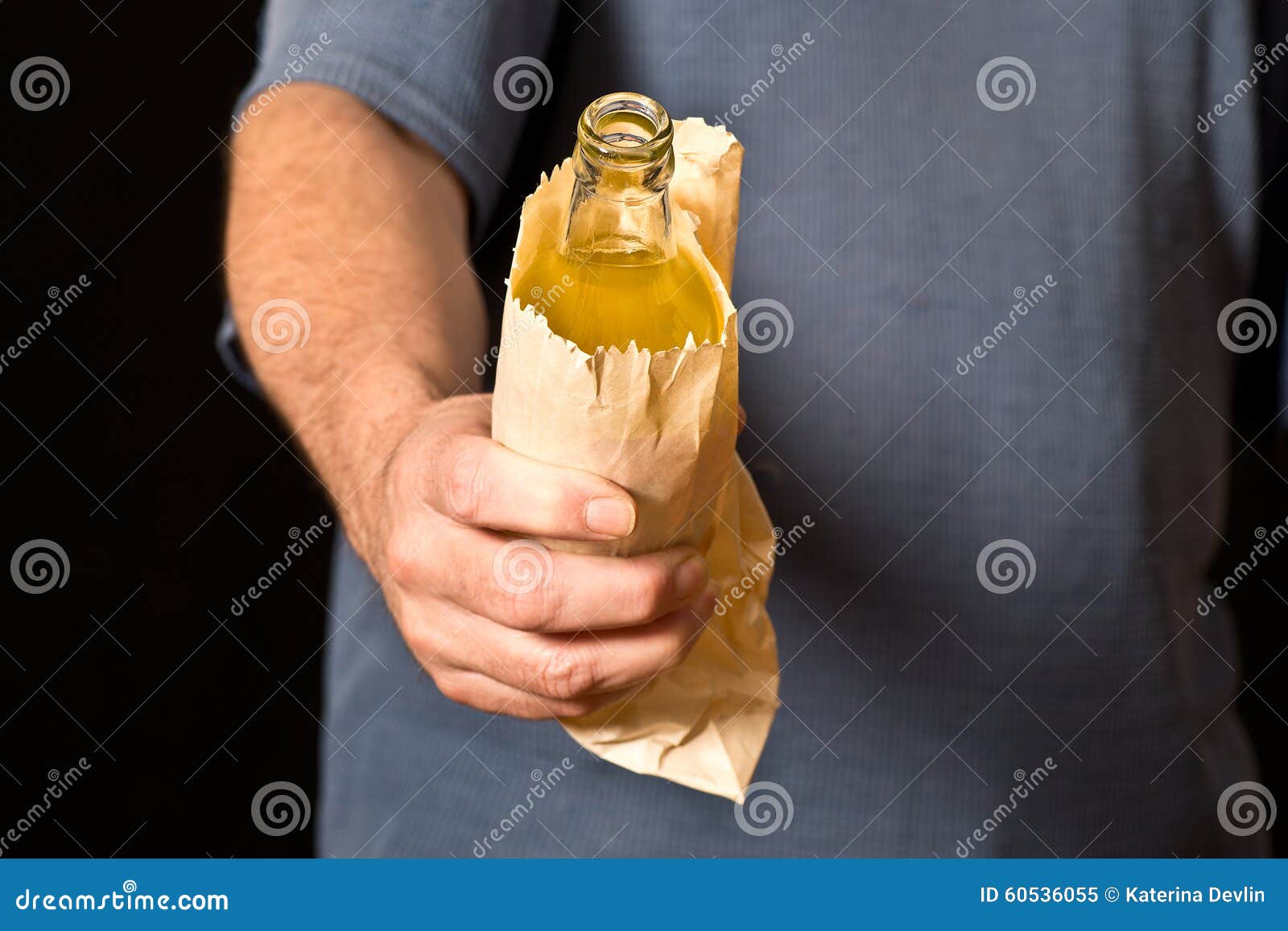 Drinker Holds a Bottle in the Paper Bag Stock Image - Image of ...