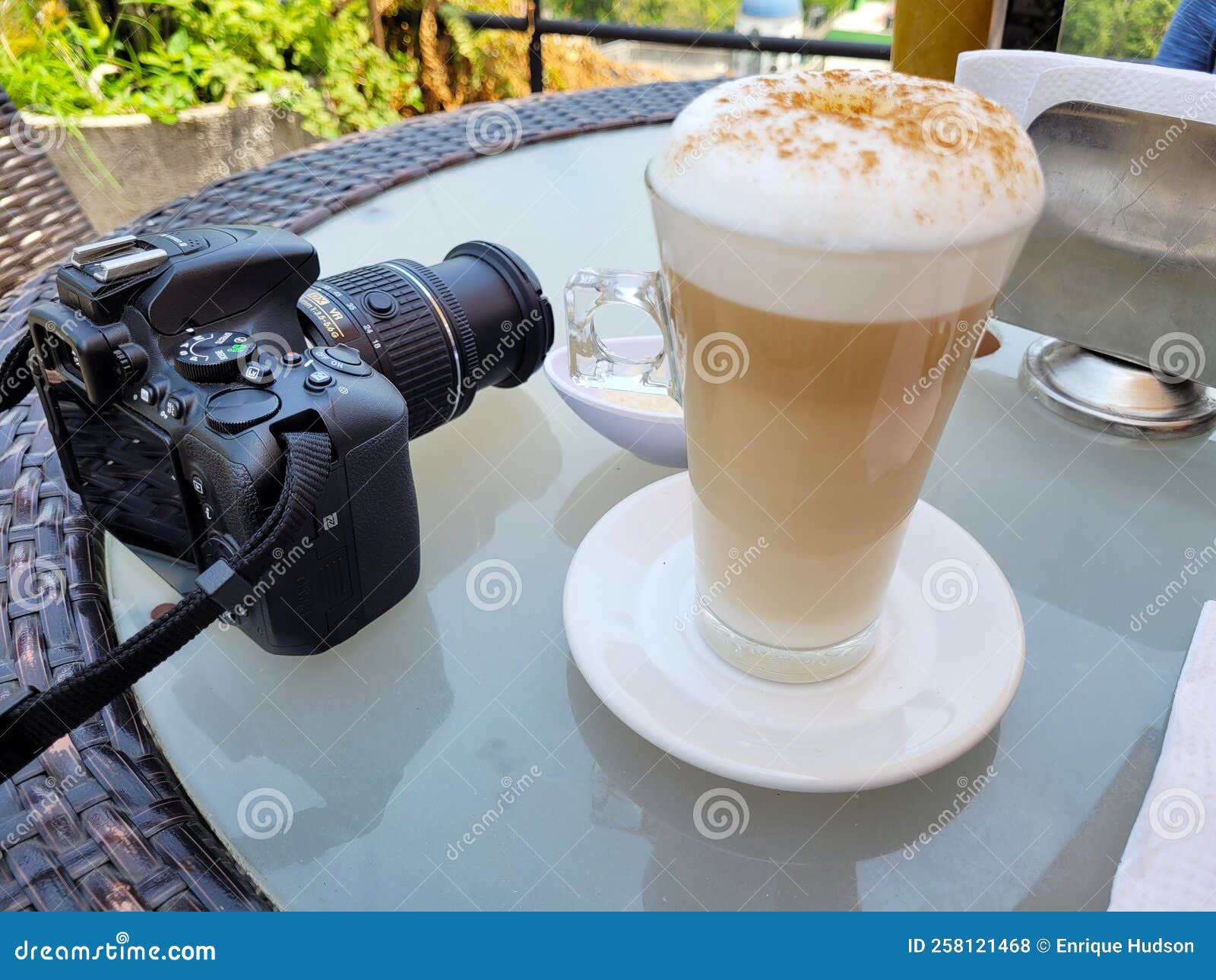 Drinking Cappuccino Coffee in the Restaurant with a Camera Ready To ...