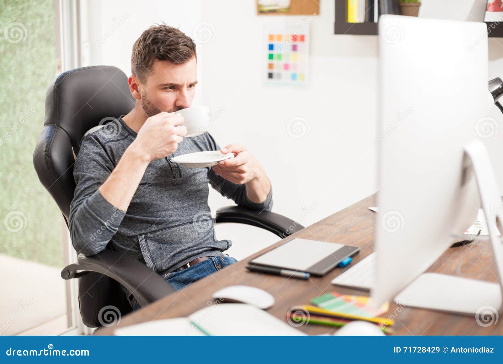 Drinking Coffee in Front of a Computer Stock Image - Image of desk ...