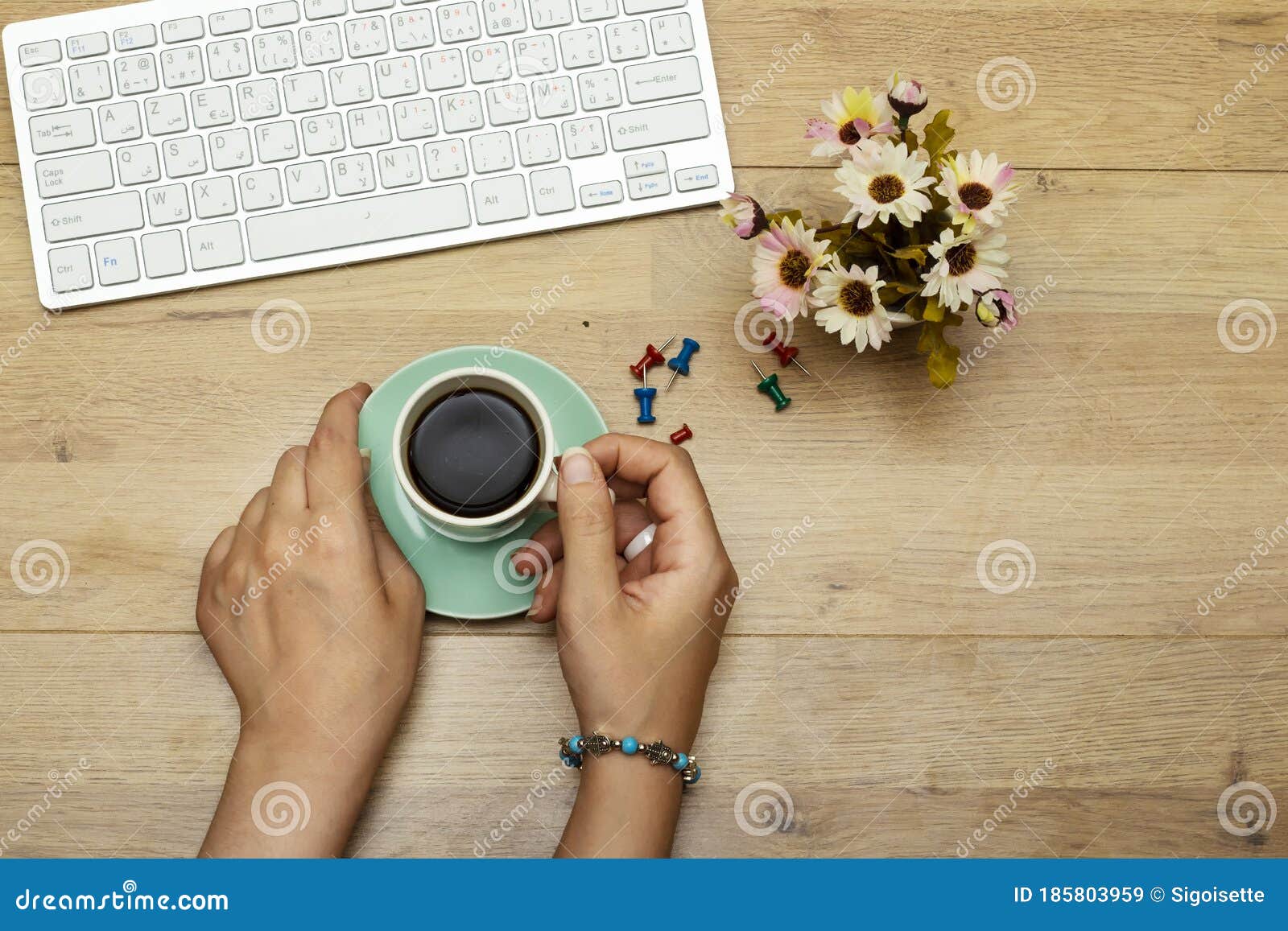 Drinking Coffee, Workplace: Keyboard and Flowers Vase Stock Image ...