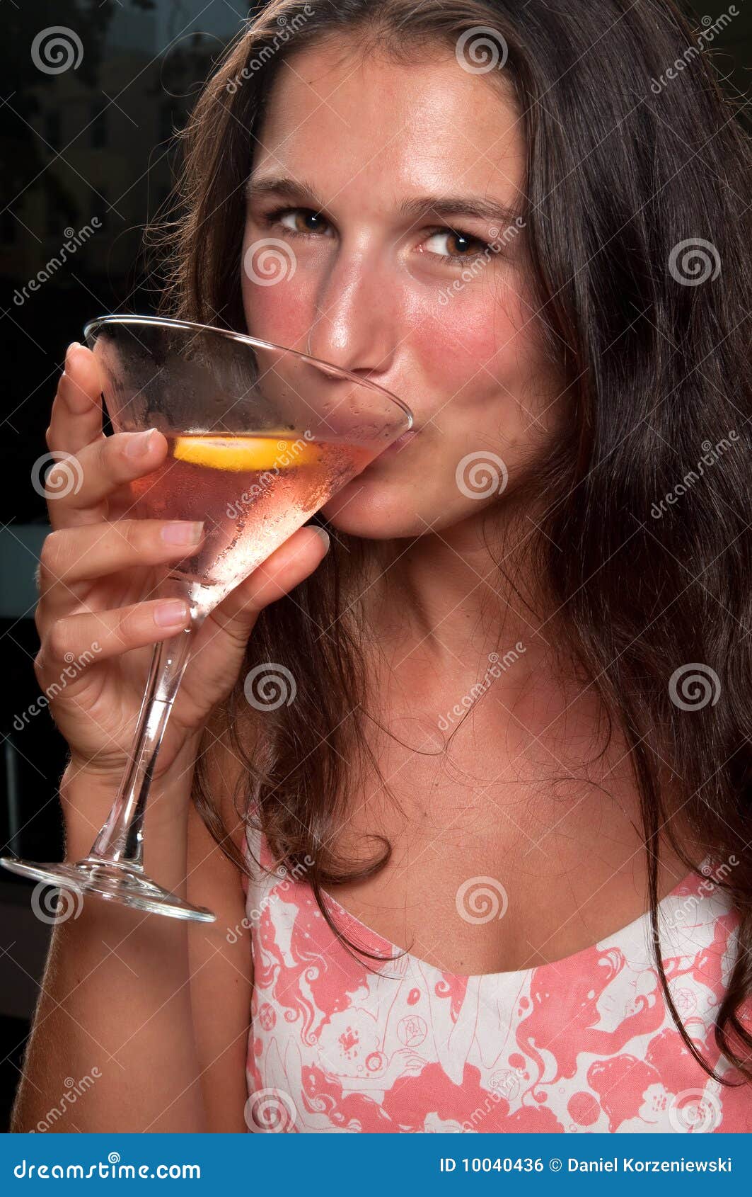 Drinking a cosmopolitan stock photo. Image of cute, look - 10040436