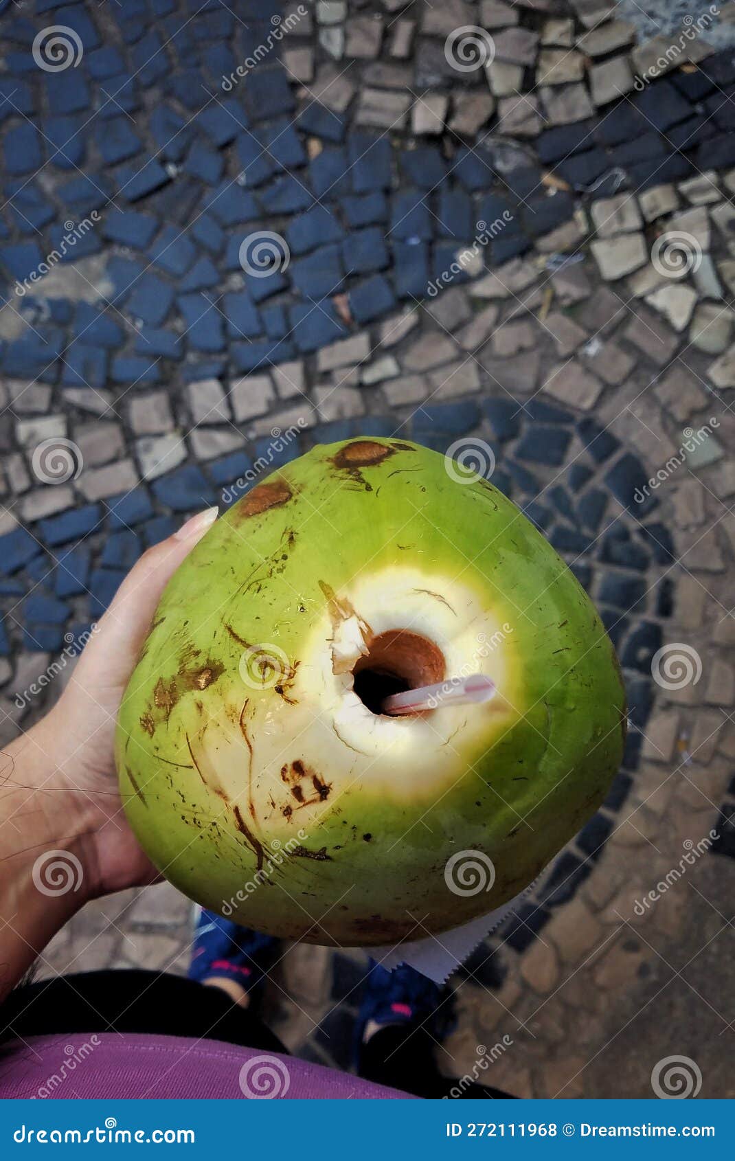 Drinking Green Coconut Water after a Run in the Park on a Sidewalk Full ...