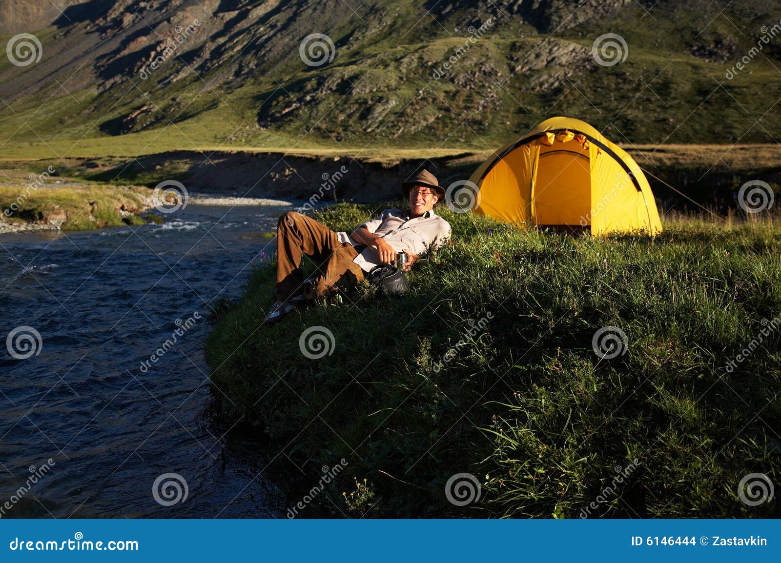 Drinking Man Near the Stream Stock Photo - Image of male, explorer: 6146444