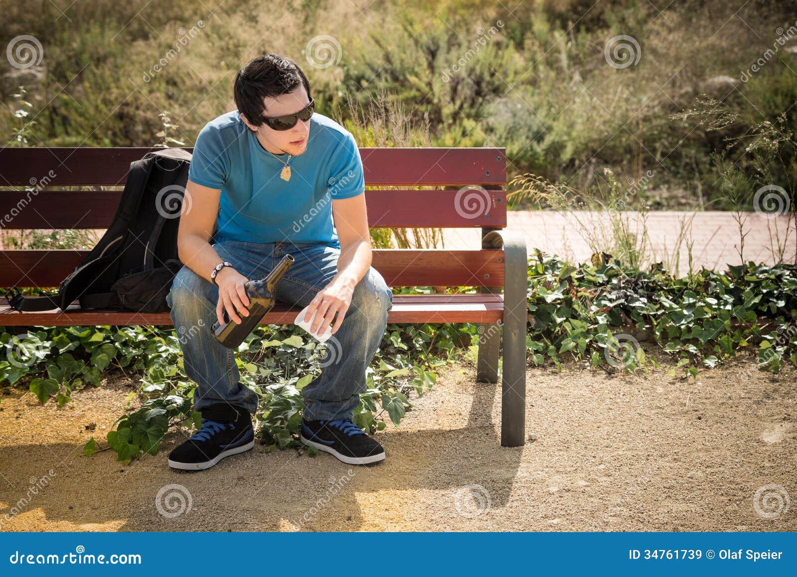 Drinking on the park bench stock image. Image of social - 34761739