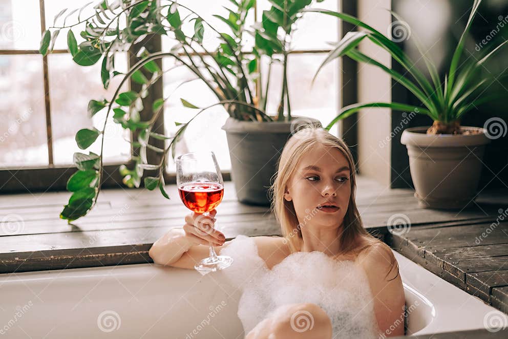 Drinking Red Wine Beautiful Blonde Young Woman Taking Bath With Bubbles