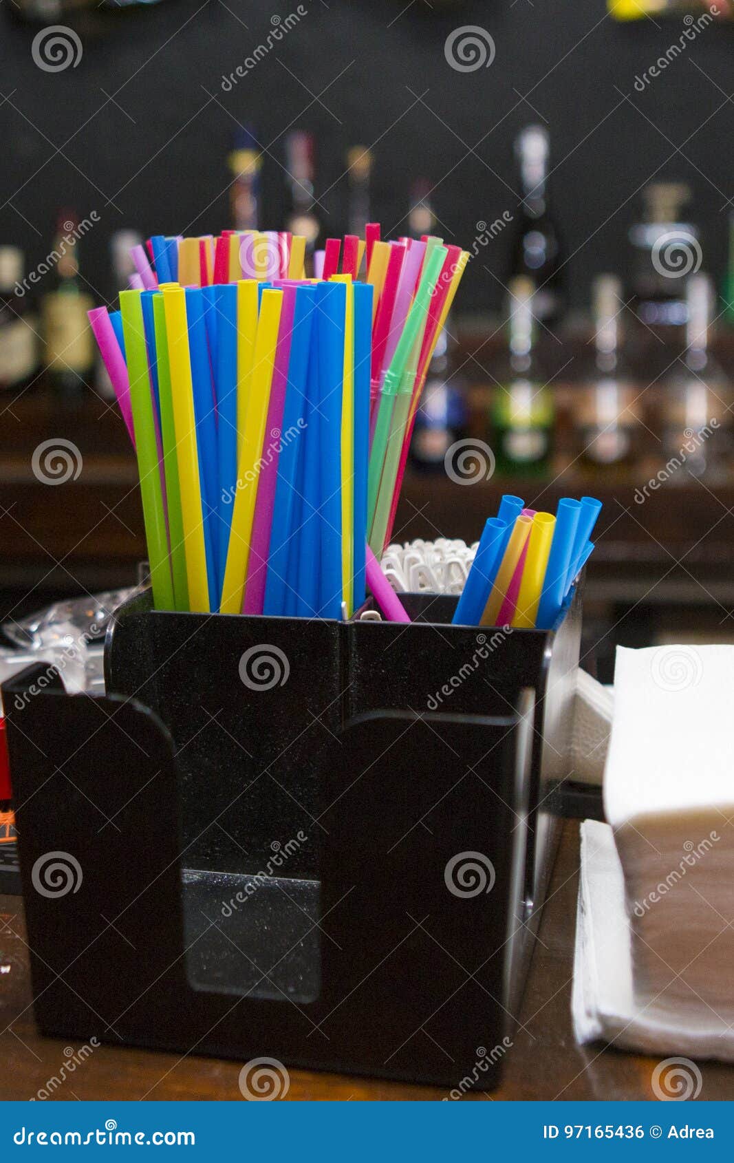 Straw holder on a bar stock photo. Image of barman, bottle - 97165436