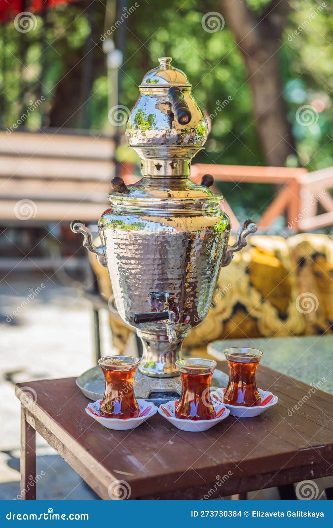 Drinking Traditional Turkish Tea with Turkish Tea Cup and Copper Tea ...