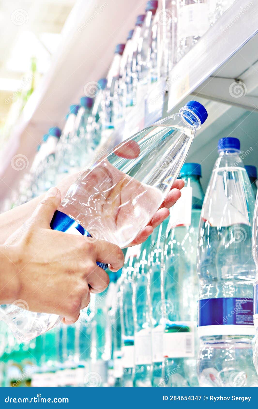 Drinking water in hand stock image. Image of consumer - 284654347