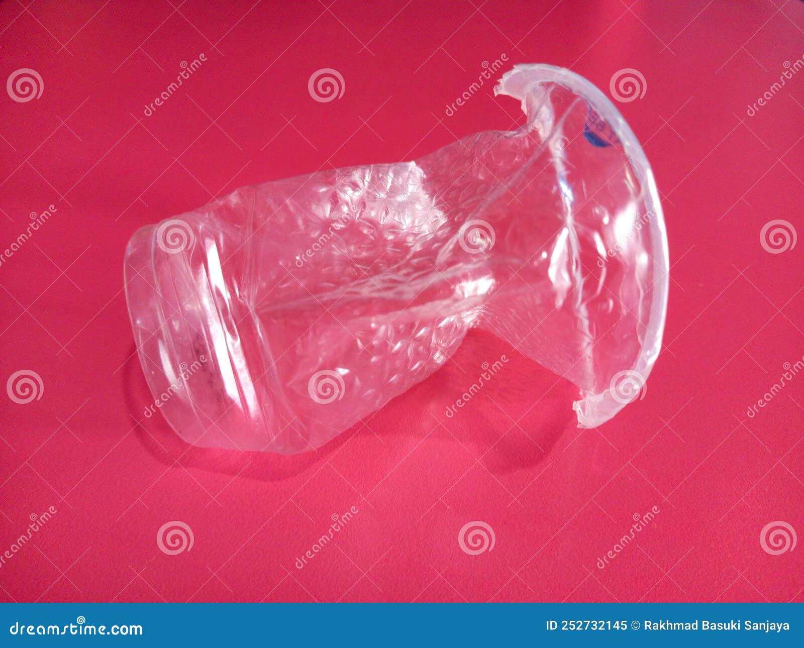 Drinking Water in an Empty Plastic Cup. Single Use Cup Stock Image ...