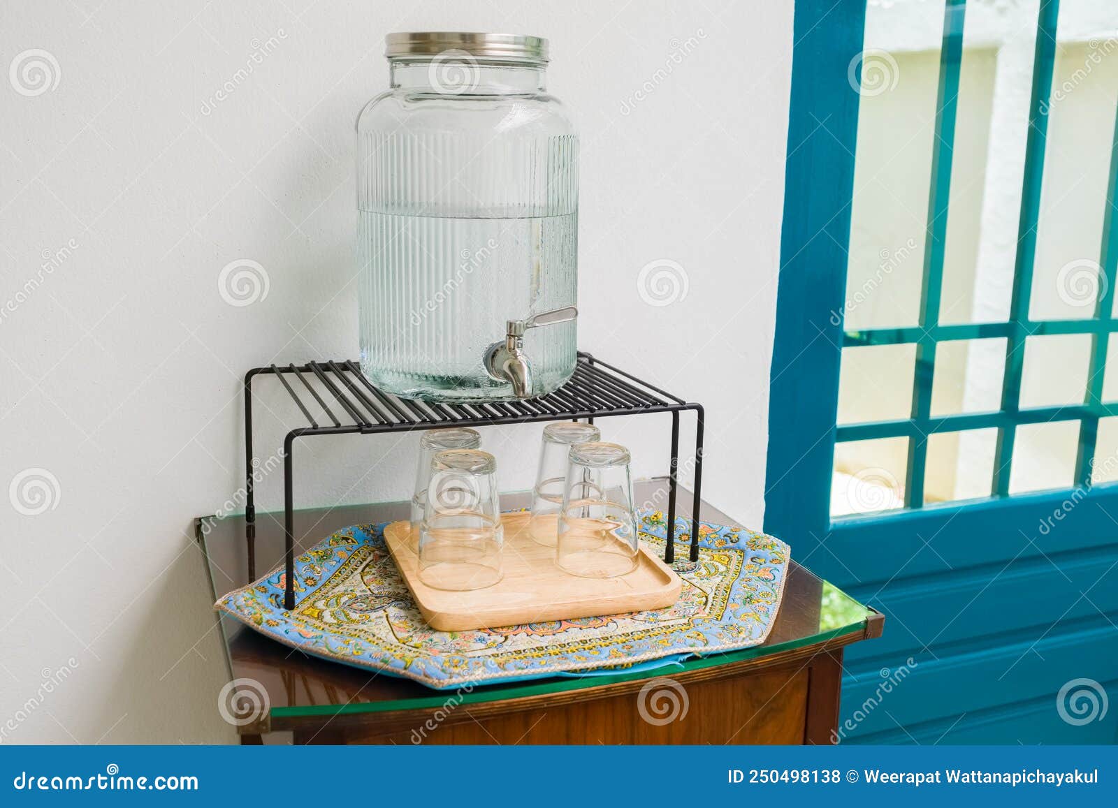 A drinking water jar stock photo. Image of faucet, tablecloth - 250498138