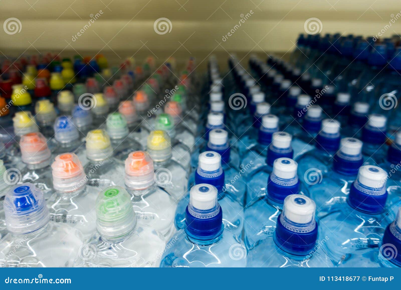 Drinking Water, Multi-colored Plastic Cap. Bottle Caps on the Market ...