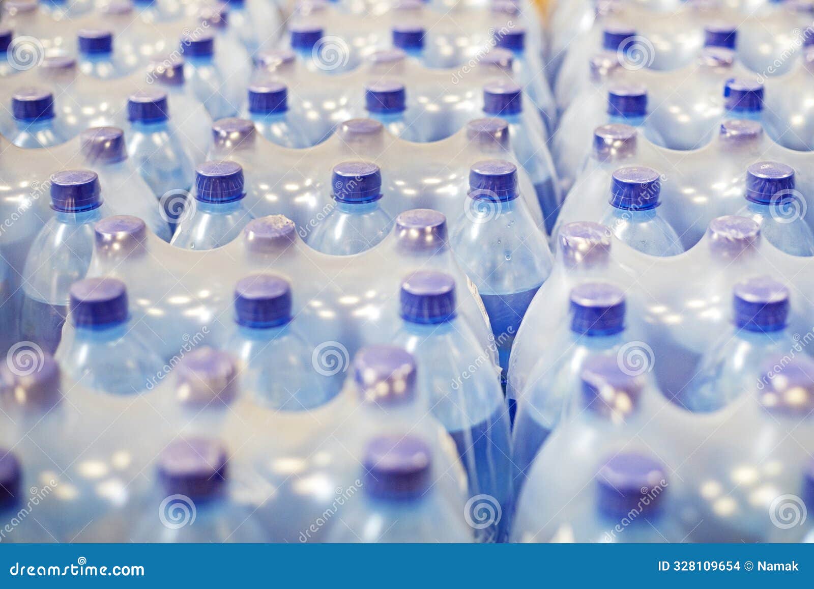 Drinking Water Packaged in Plastic Containers on the Shelves Stock ...