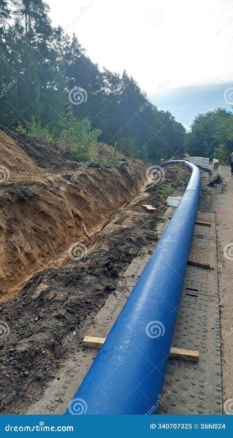Drinking Water Pipeline Under Construction in Deep Ditch Stock Image ...