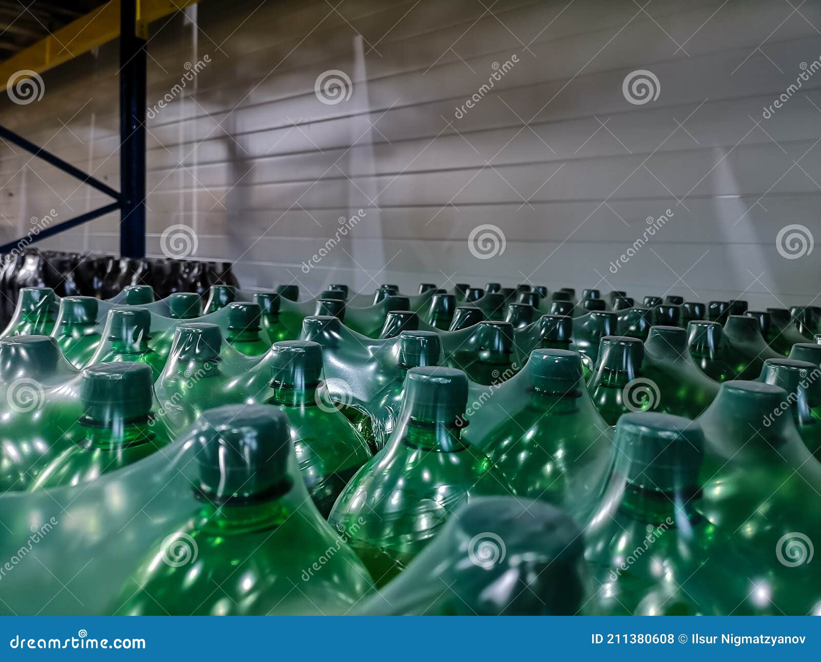 Drinking Water in Plastic Bottles is Packed in Polythene Packaging and ...