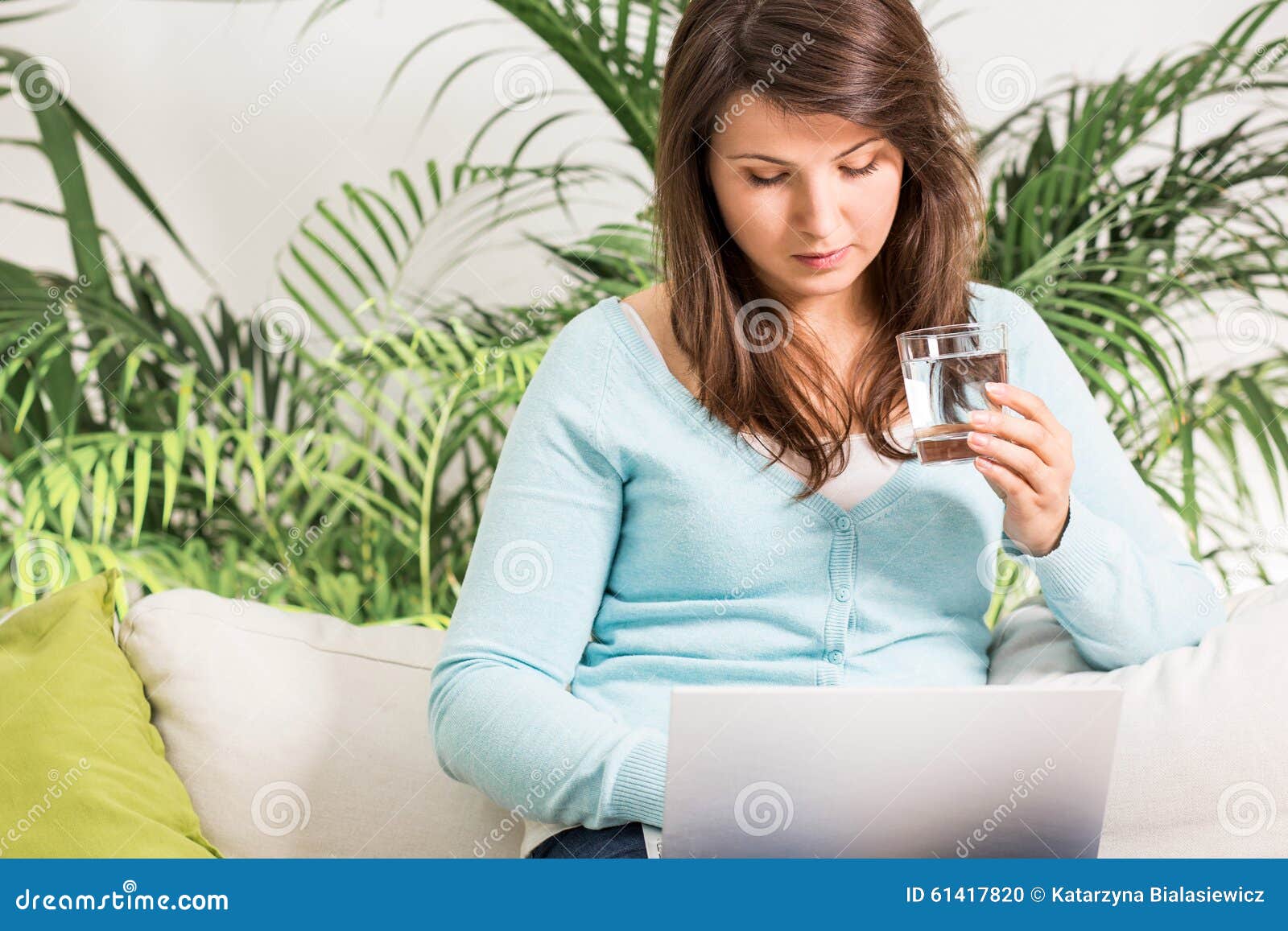 Drinking Water and Using Laptop Stock Photo - Image of water, computer ...