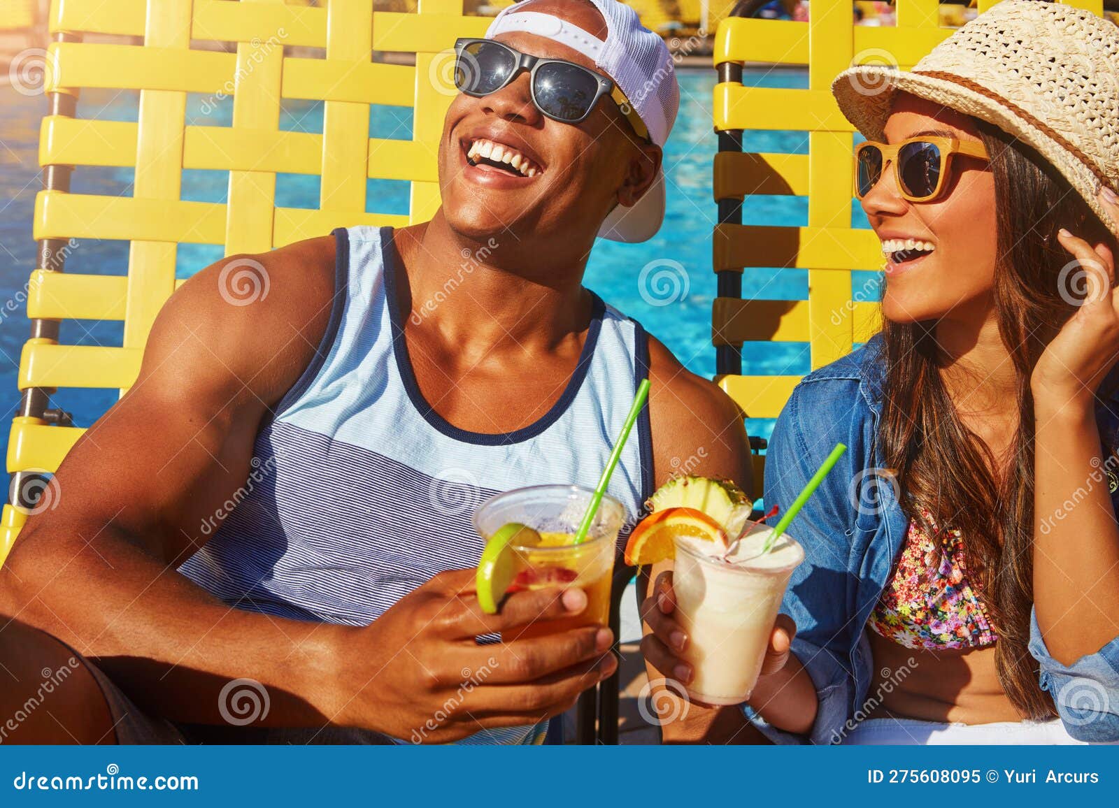Drinks by the Pool. an Affectionate Young Couple Enjoying a Few Drinks ...