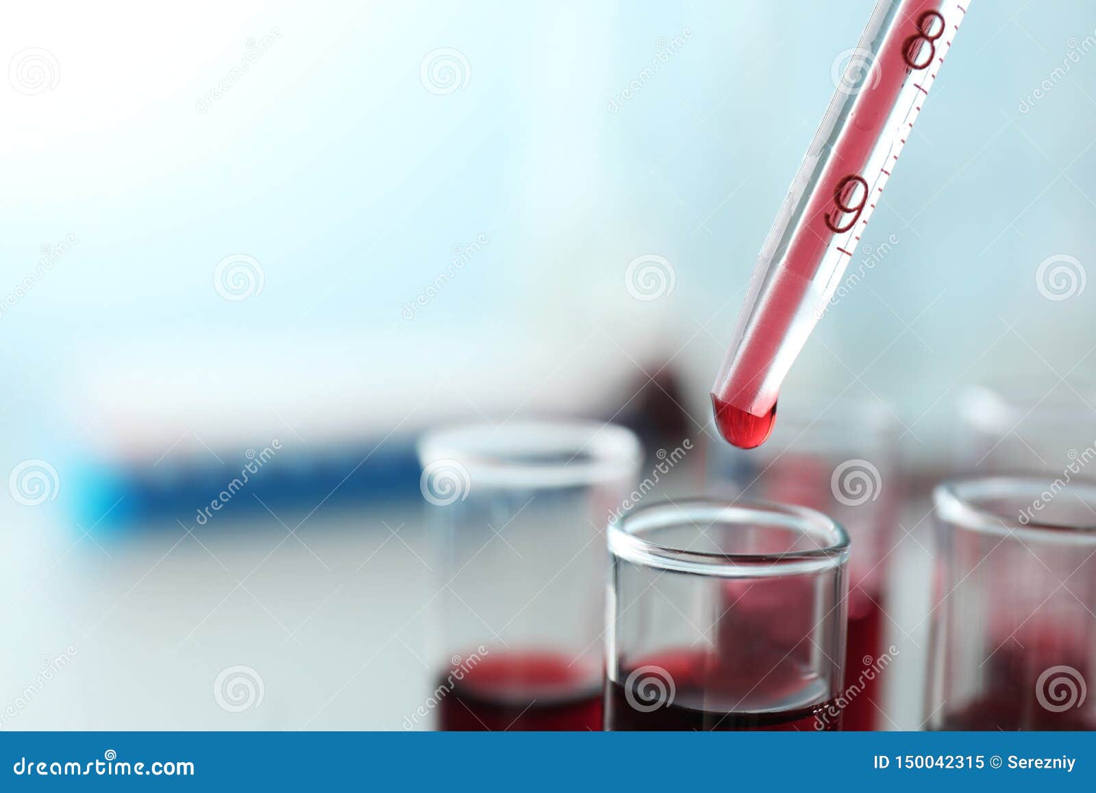 Dripping Blood into Test Tubes, Closeup Stock Image - Image of ...