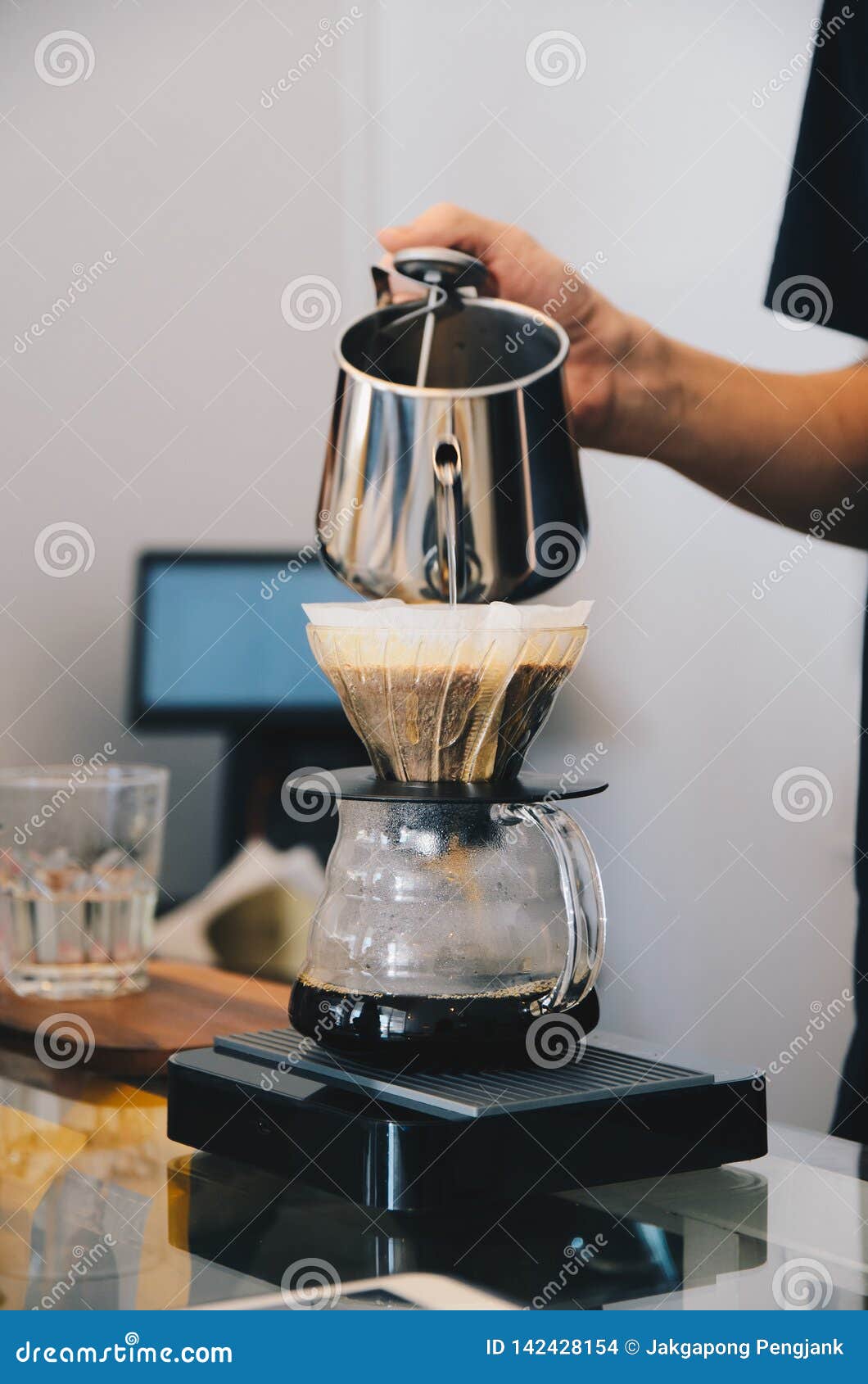 Dripping coffee in cafe stock photo. Image of brown - 142428154