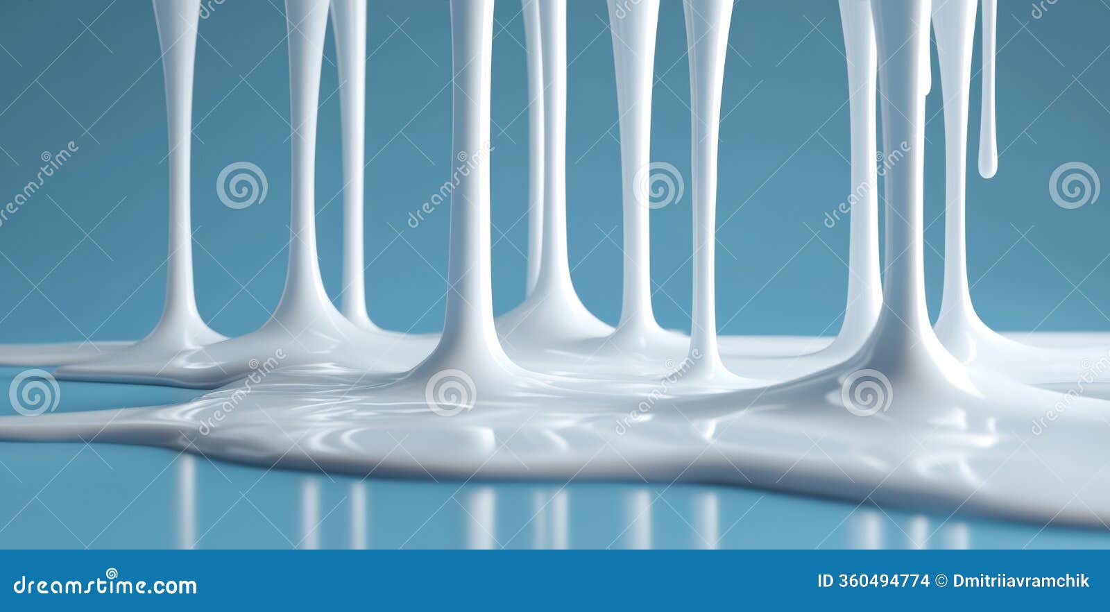 Dripping Creamy White Material on a Blue Backdrop Creates a Visually ...