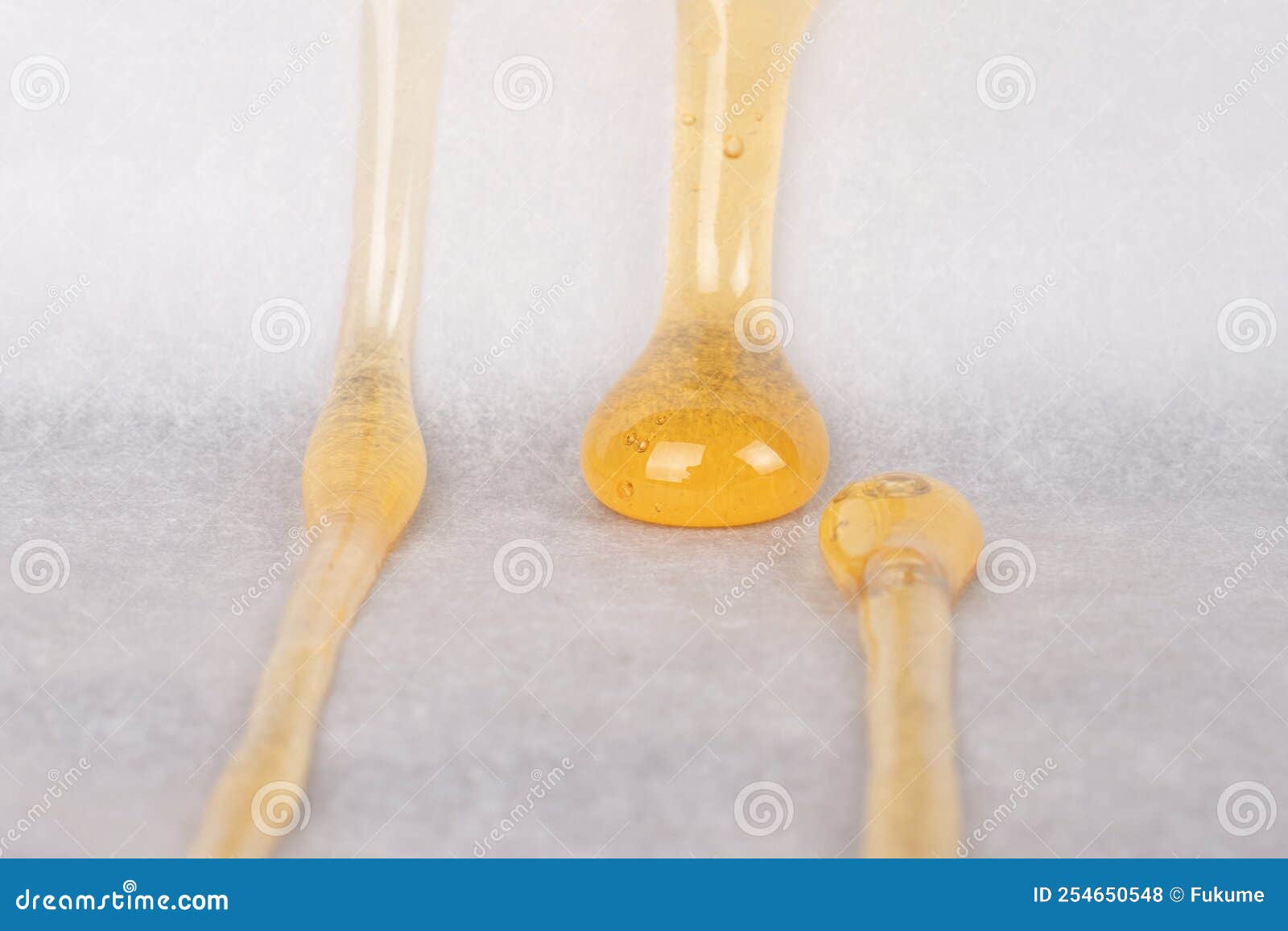 Dripping Drops of Yellow Cannabis Wax with a High Content of Thc on ...