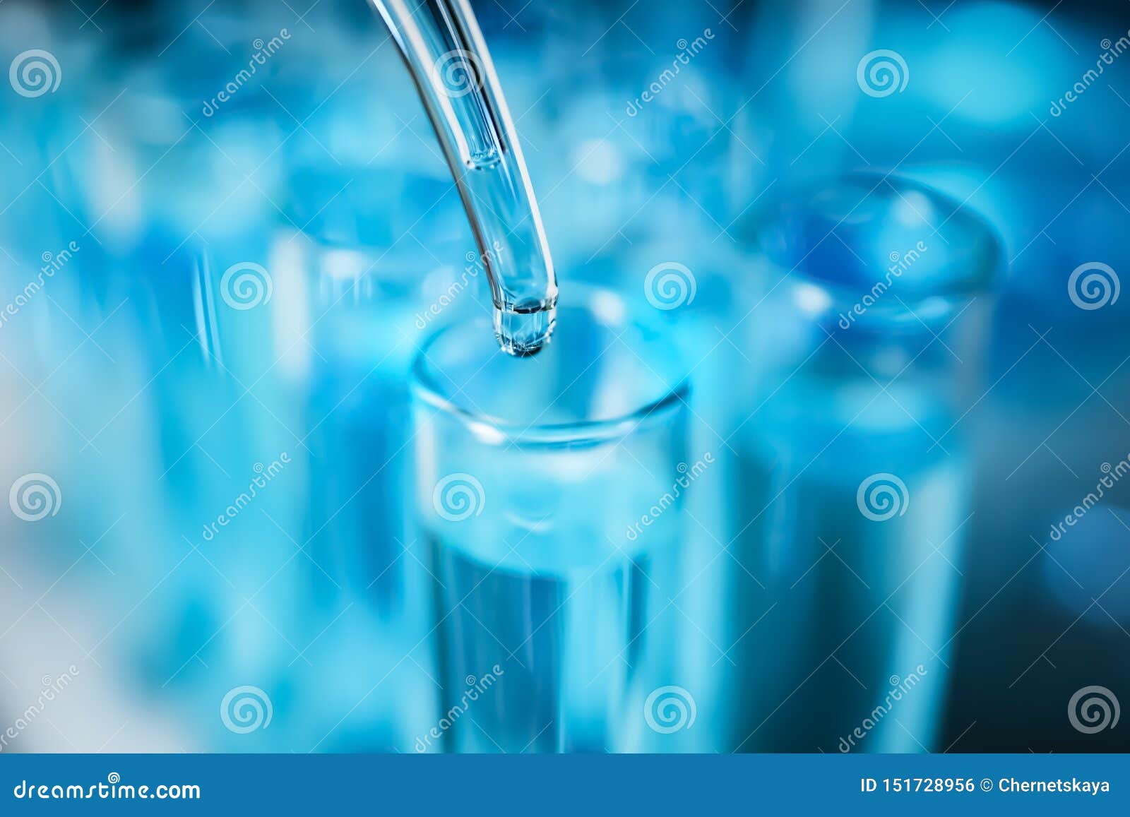 Dripping Liquid into Test Tube. Solution Chemistry Stock Photo - Image ...