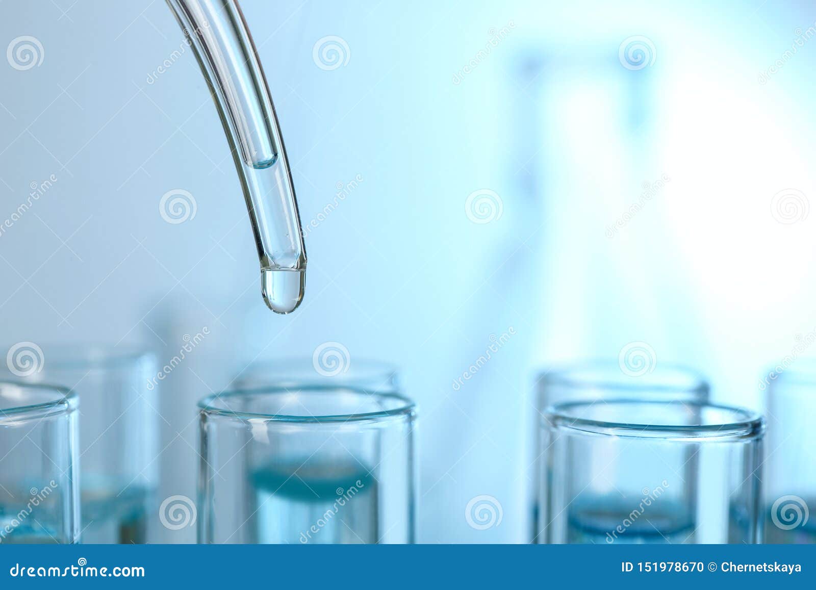 Dripping Liquid into Test Tube, Closeup. Solution Chemistry Stock Photo ...