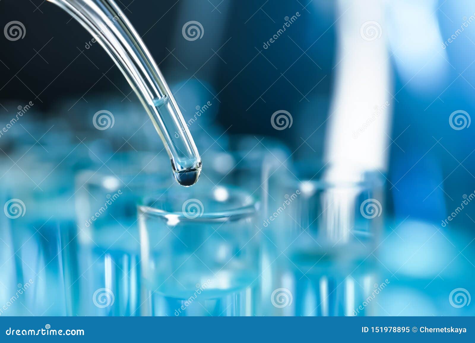 Dripping Liquid into Test Tube, Closeup. Solution Chemistry Stock Image ...