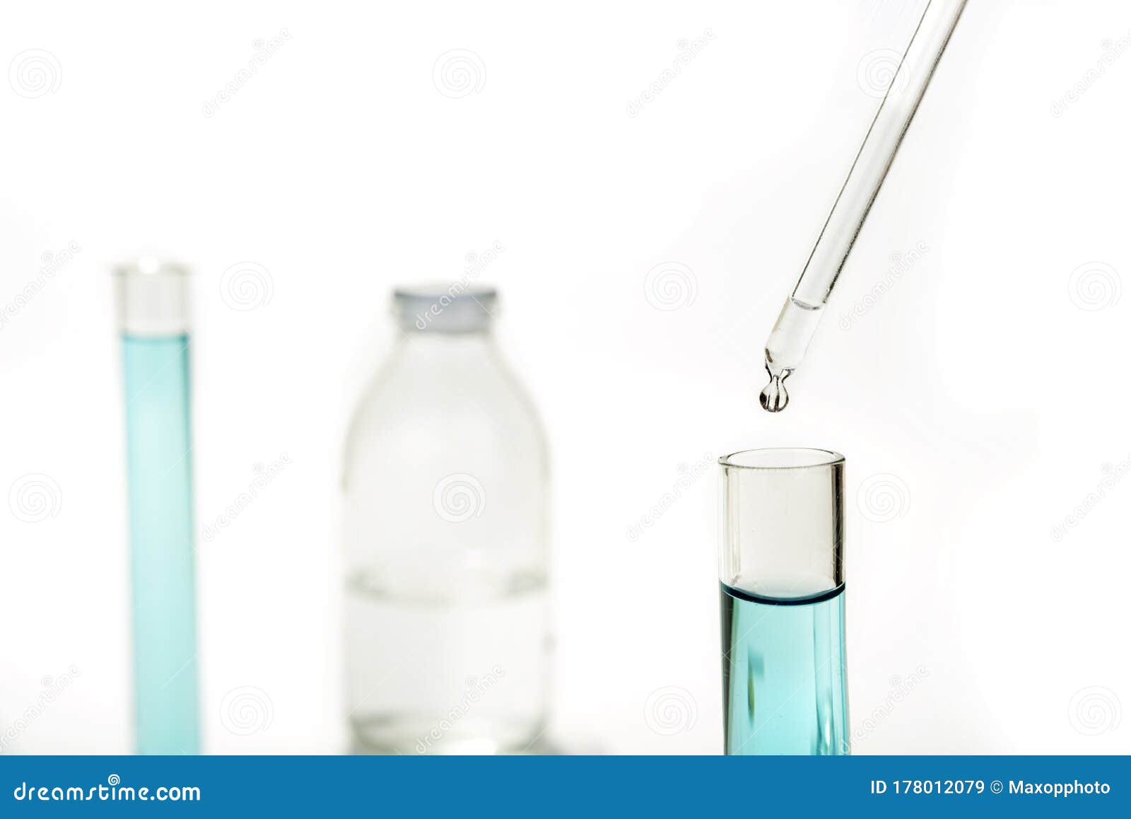 Dripping Reagent into Test Tube with Liquid Sample Stock Image - Image ...