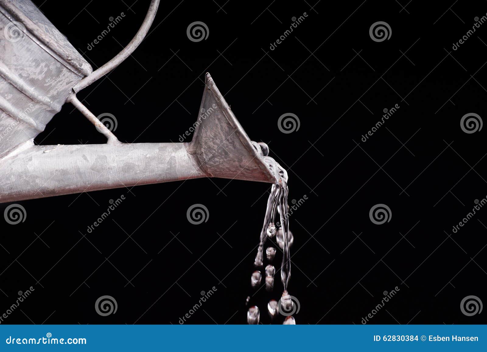 Dripping watering can stock photo. Image of metal, isolated - 62830384