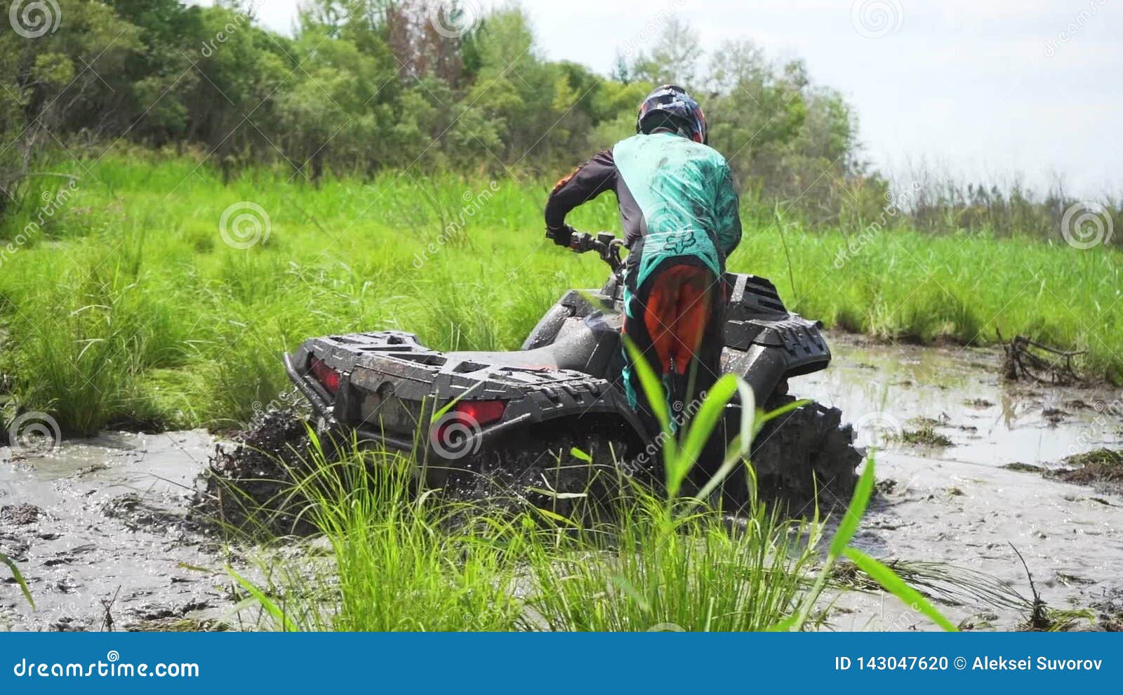 Drive ATV through Swamp, Water, Mud and Mud. Slow Motion Stock Footage ...