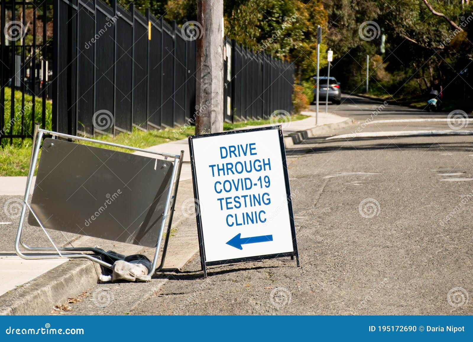Drive through COVID-19 Testing Clinic Sign on a Road Stock Photo ...