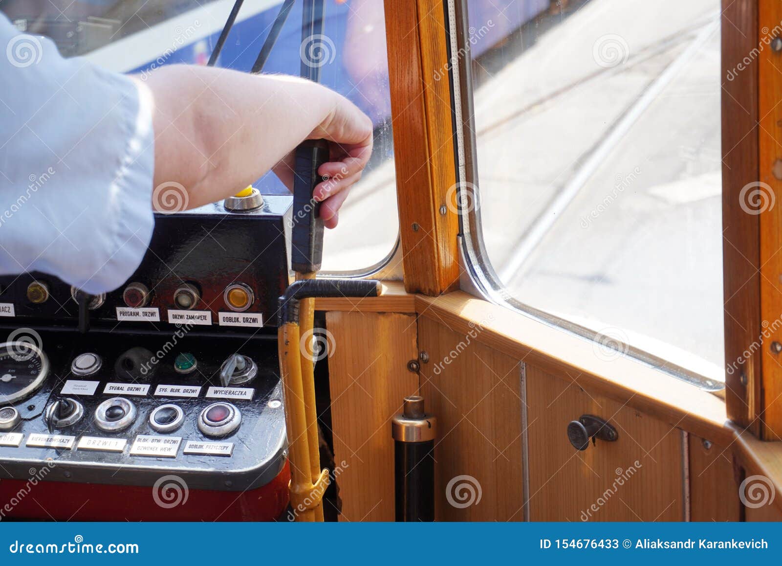Drive of the Old Wooden Tram, the Driver at the Controls of the Tram ...