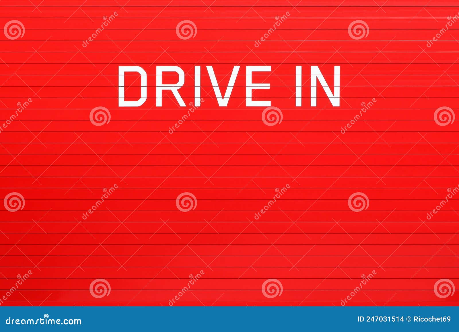 Drive in sign on a wall stock photo. Image of objects - 247031514