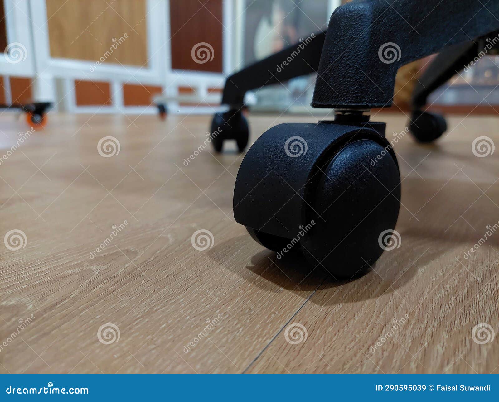 Drive wheels on the chair stock image. Image of room - 290595039