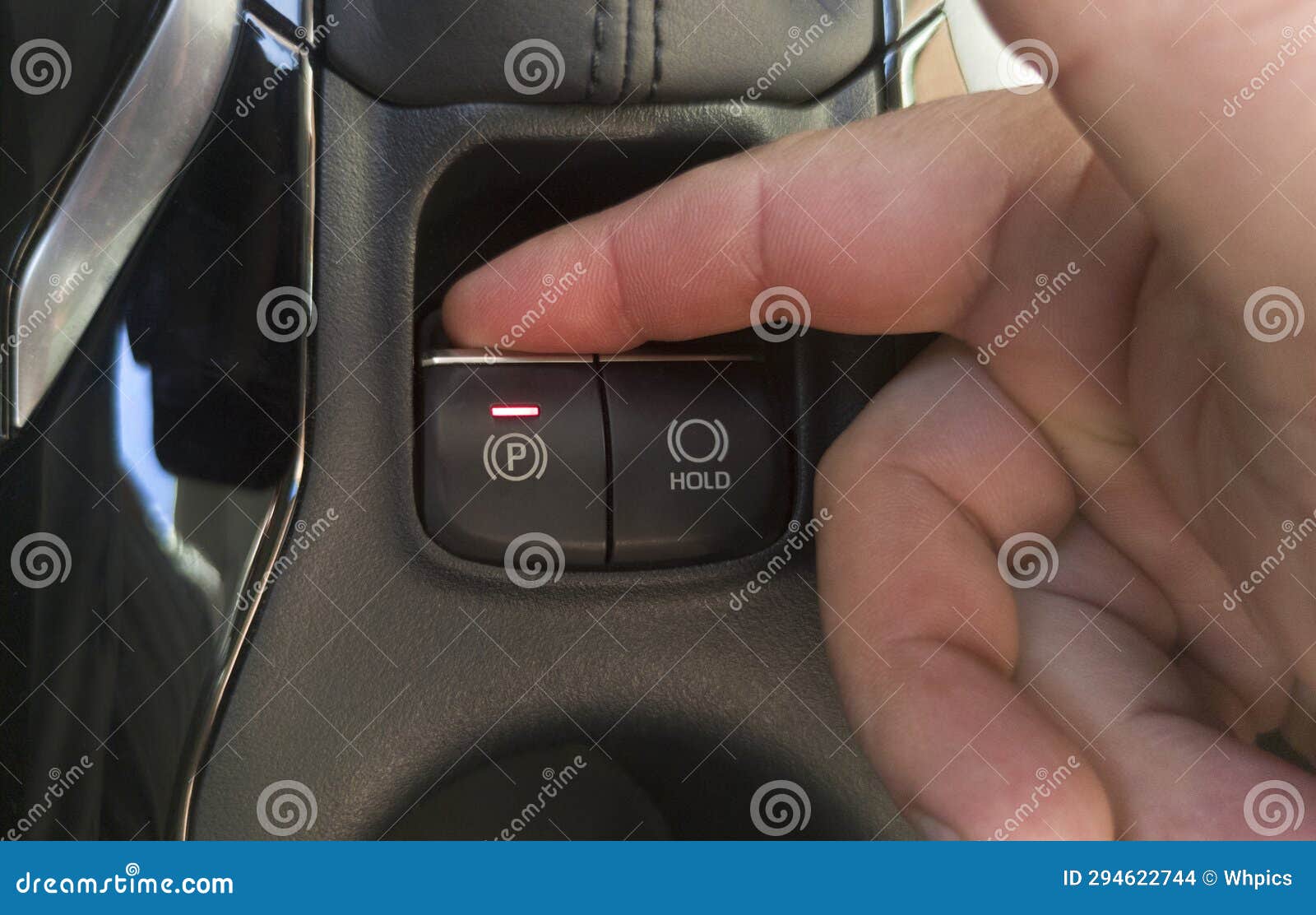 Driver Activating the Electric Parking Brake of His Car Stock Photo ...
