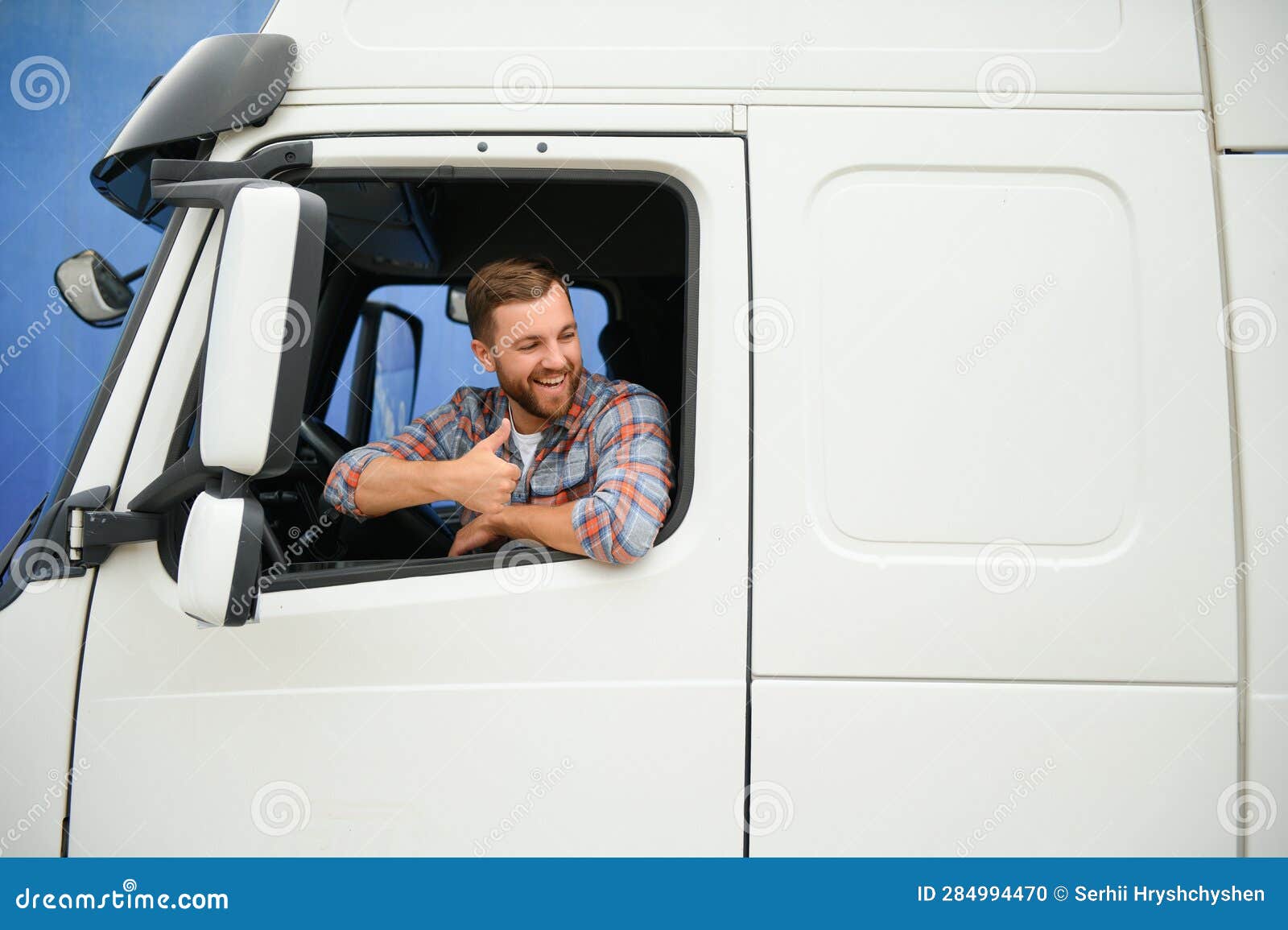 Driver Behind the Wheel in Truck Cabin Stock Photo - Image of sitting ...