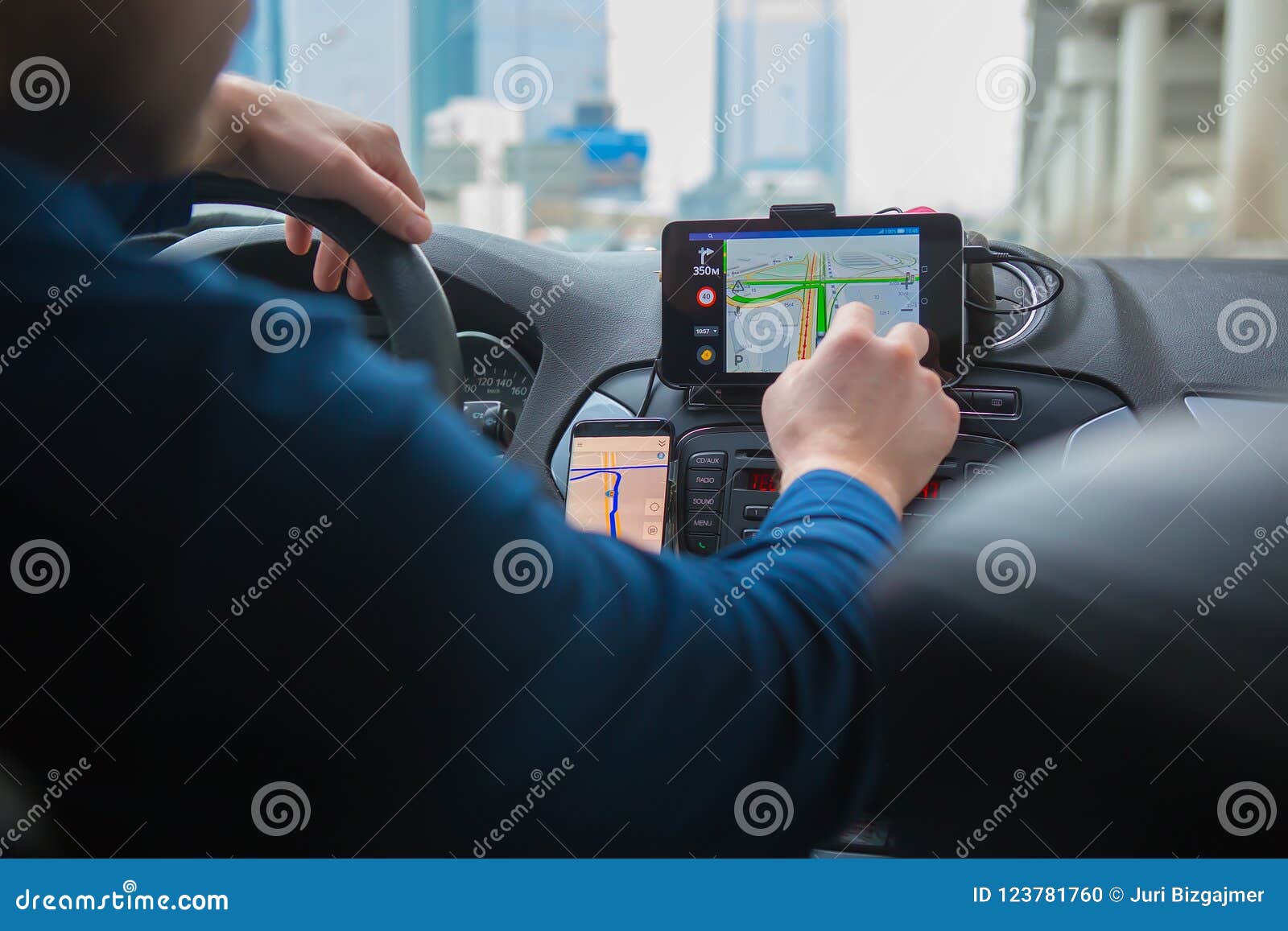 Driver in the Car Controls the Navigator. Stock Photo - Image of device ...