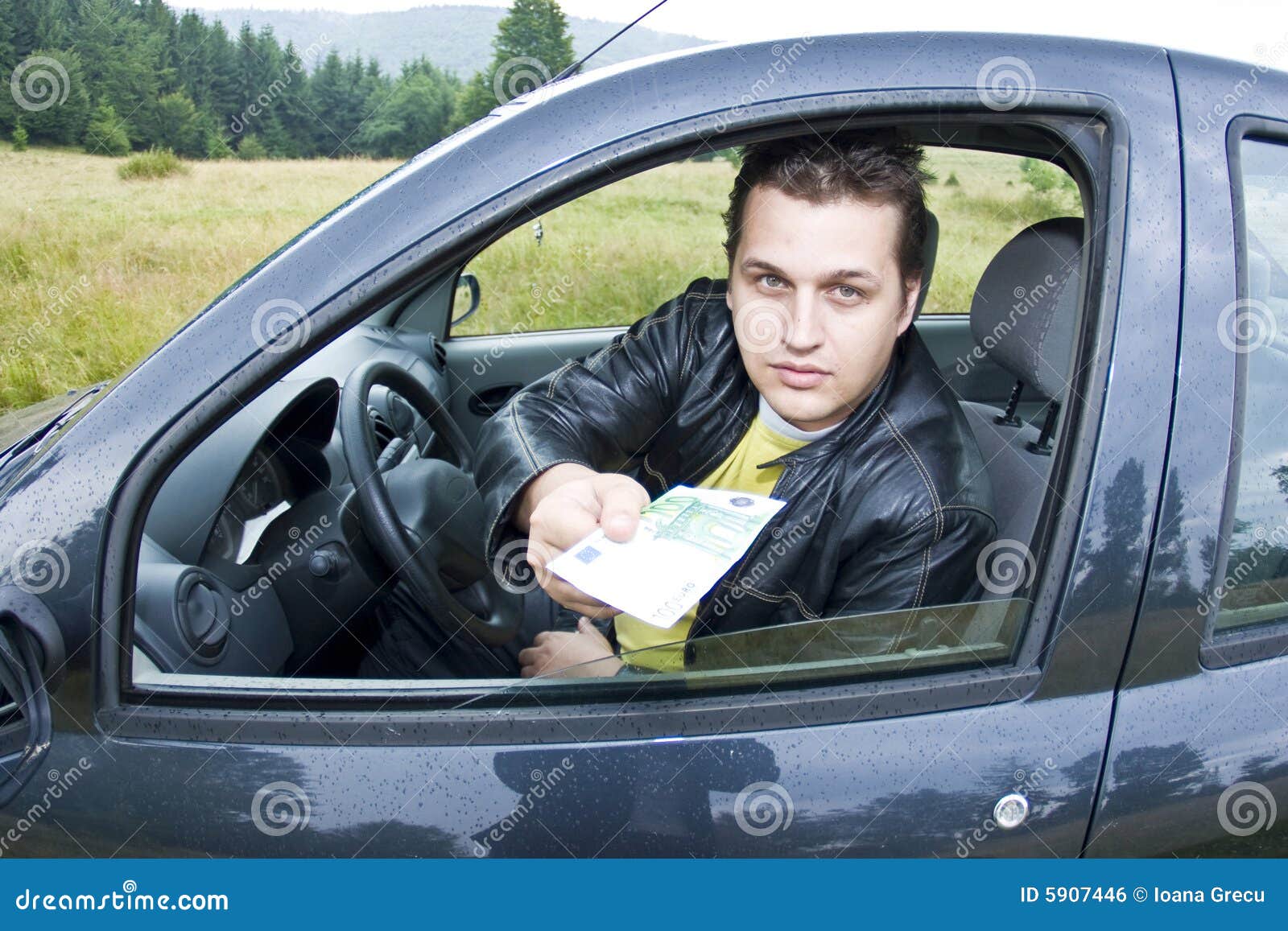 Driver in Car with Money stock photo. Image of driven - 5907446